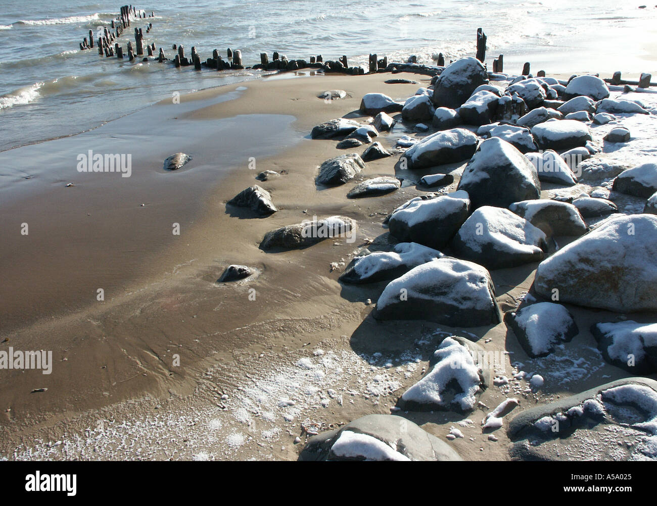 Snow on the beach Stock Photo - Alamy