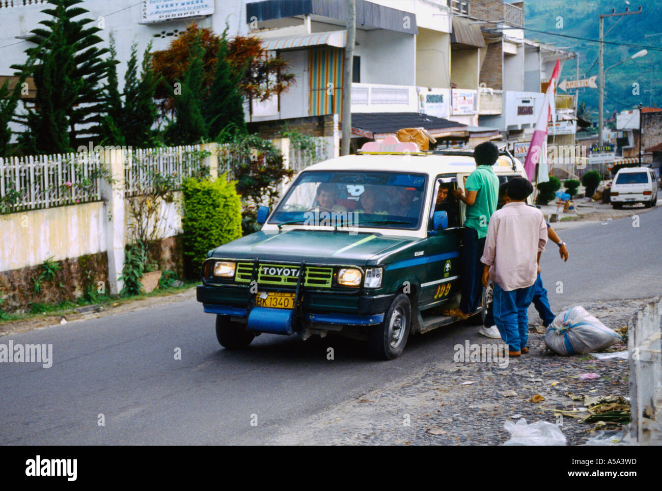 Sumatra Indonesia Overloaded Bemo Toyota Stock Photo - Alamy