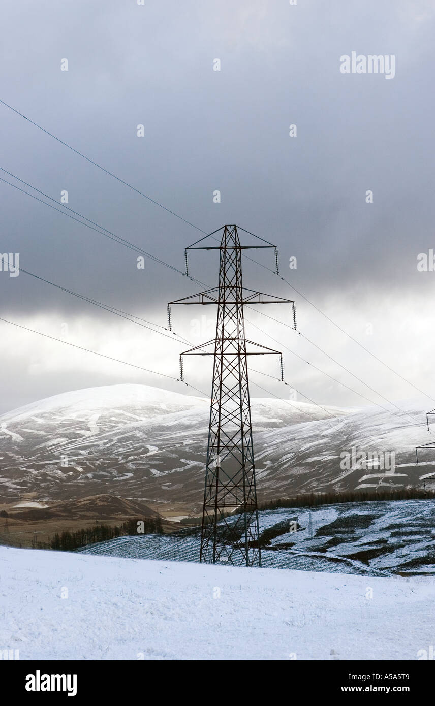 Electricity pylon on heather moors, showing heather burning patterns ...