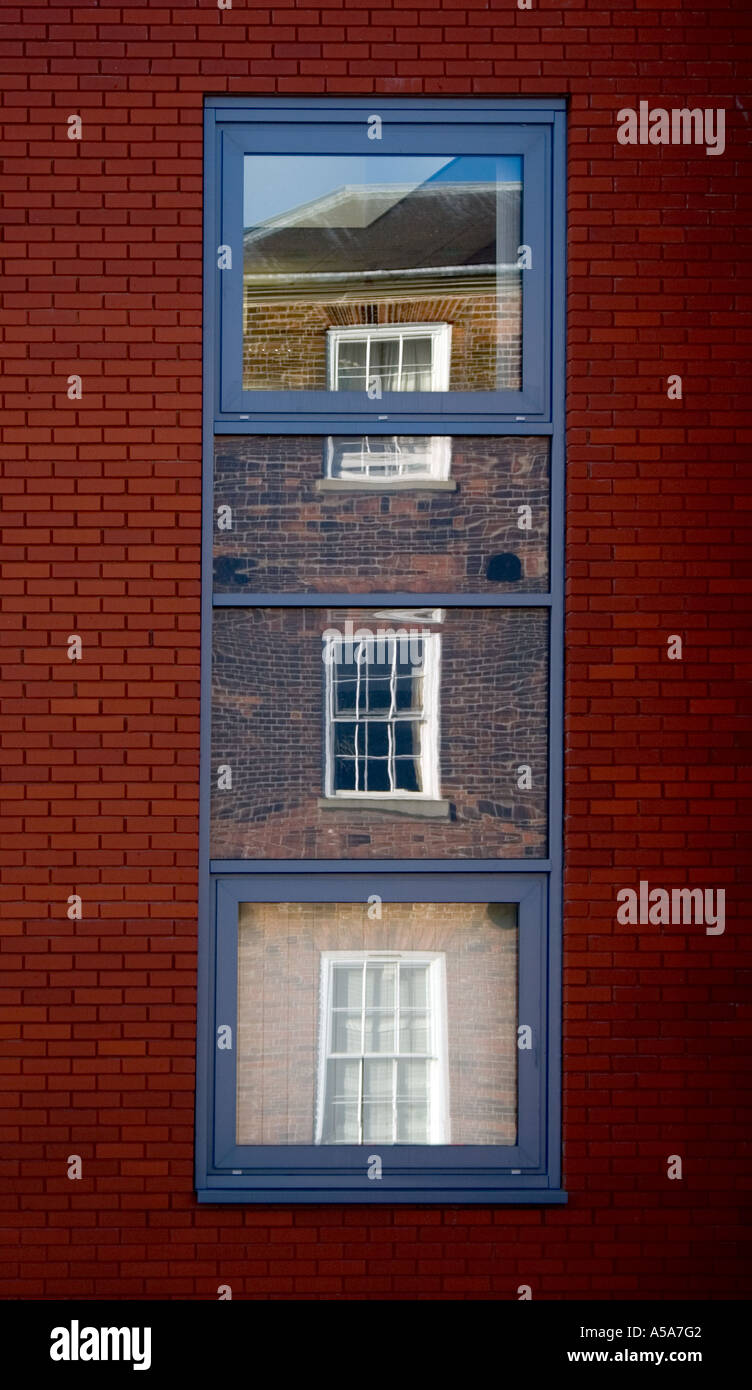 The contrast between old and new architecture windows Stock Photo - Alamy