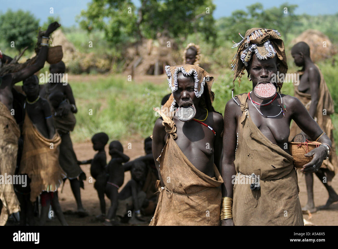 Mursi tribe women with lip plate, Lower Omo Valle, Ethiopia Stock Photo ...