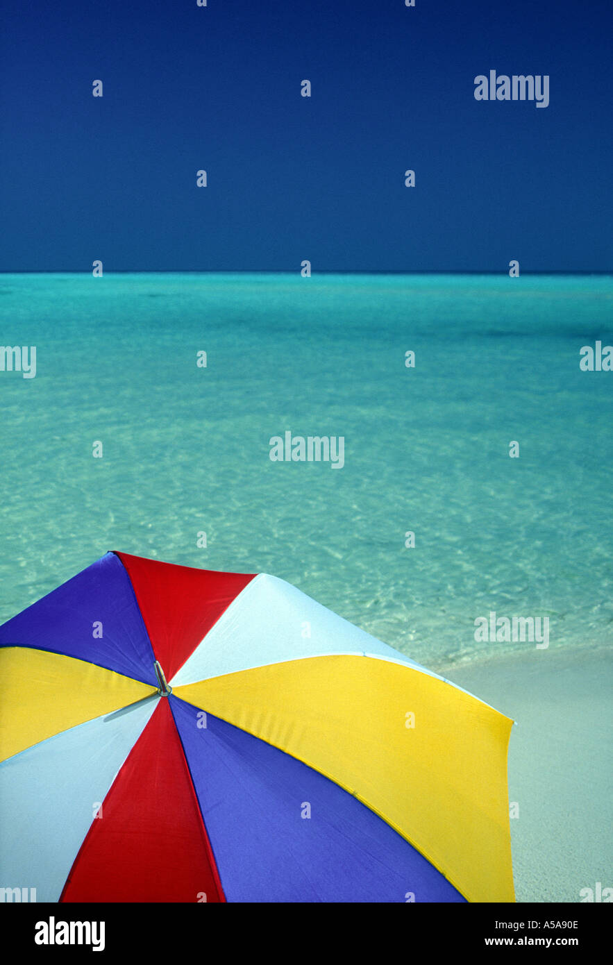 sun umbrella on tropical beach Maldives Stock Photo - Alamy