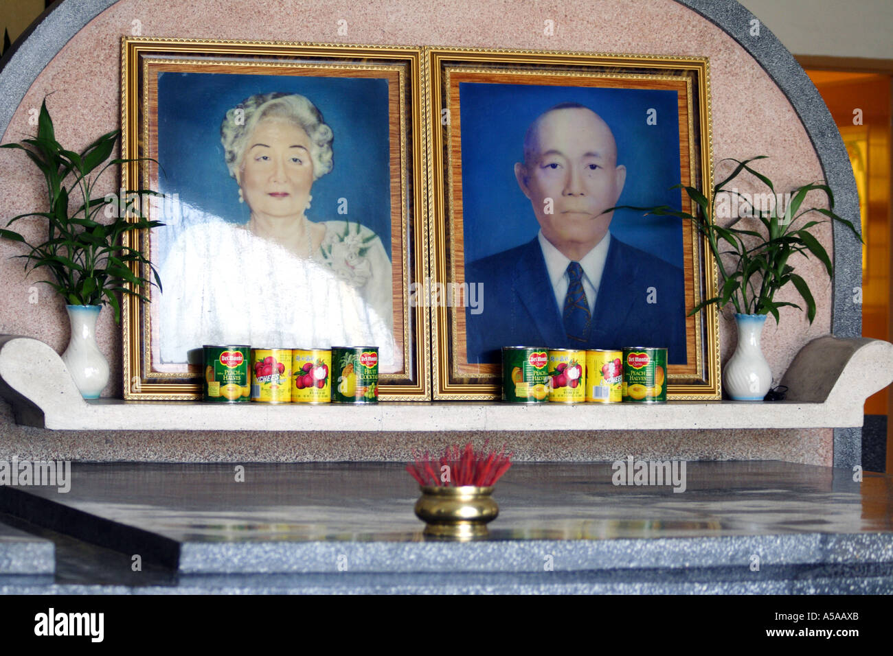 Philippine Islands, Portraits of the dead in an ornate tomb in the ...