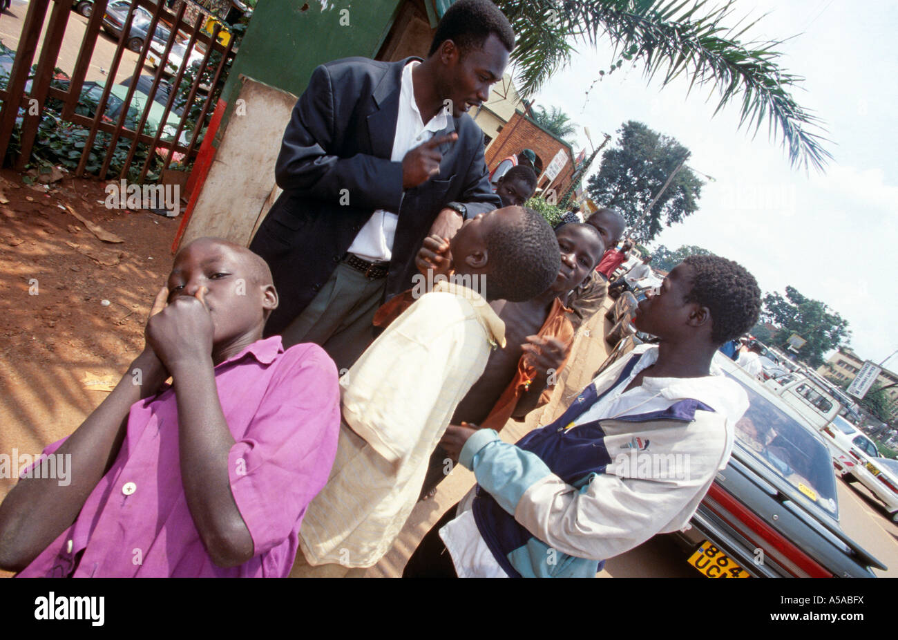 A group of drug addicts on the street of Kampala Uganda Stock Photo - Alamy