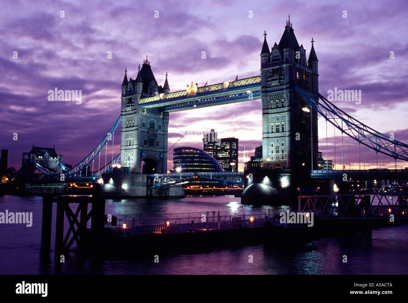 tower bridge sunset view towards tfl building london uk Stock Photo - Alamy
