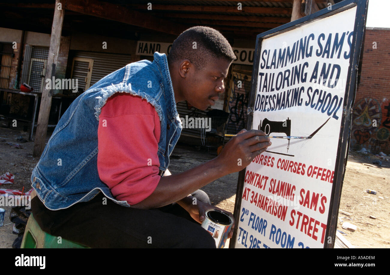 Man handpainting signage, Johannesburg, South Africa Stock Photo - Alamy