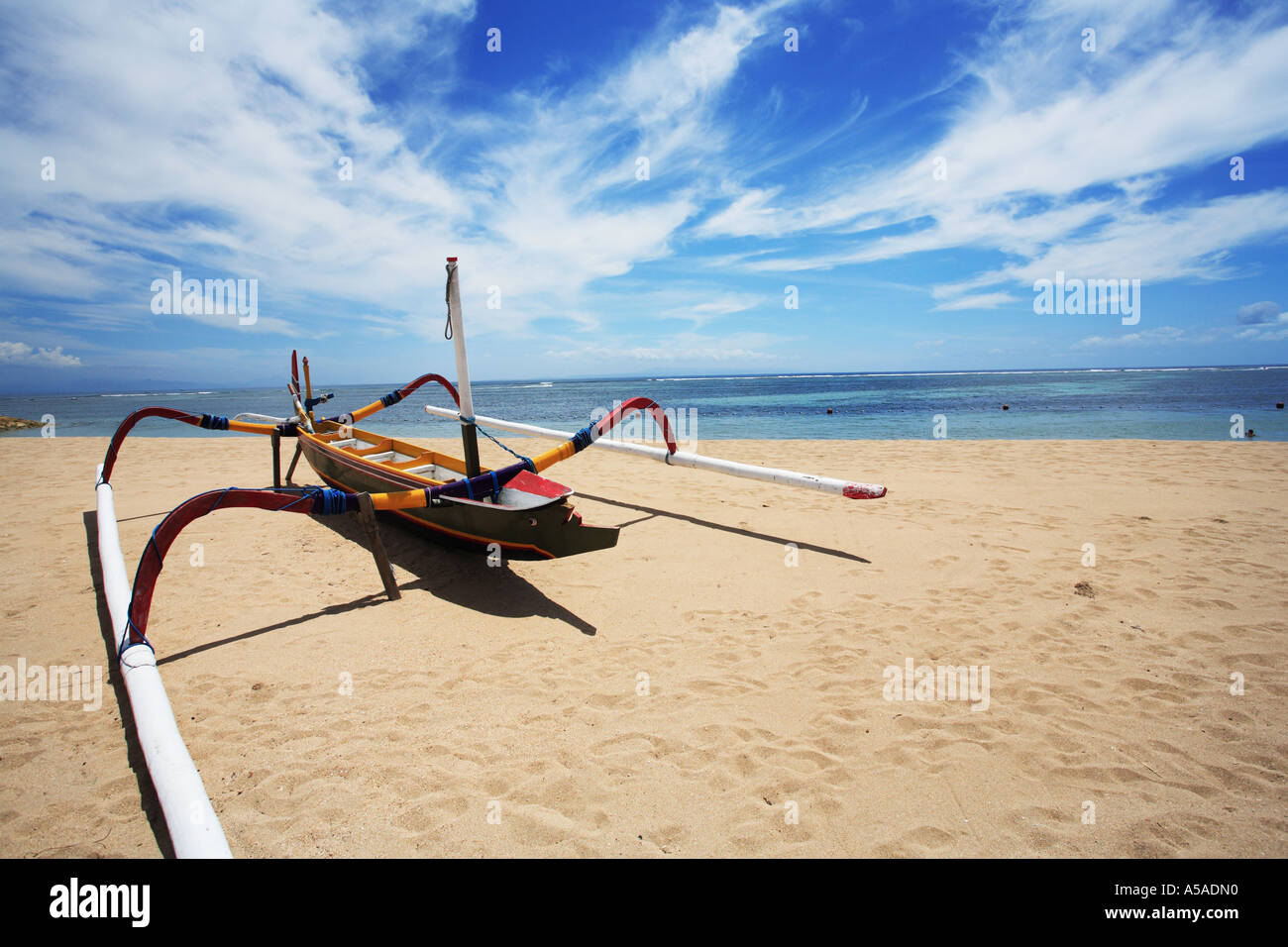 A boat on a beautiful beach Stock Photo - Alamy