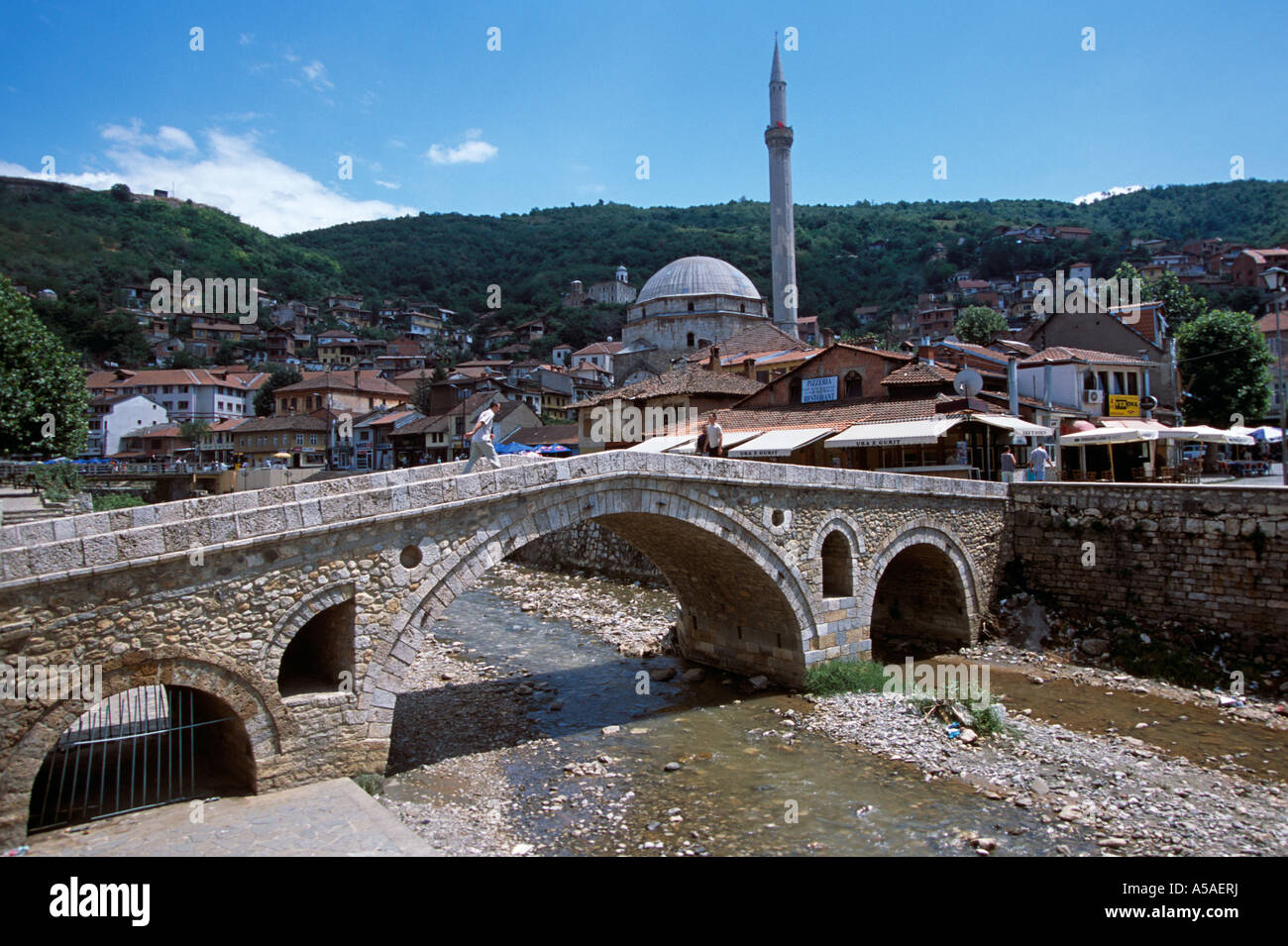 People crossing bridge, Kosovo Serbia and Montenegro Stock Photo - Alamy