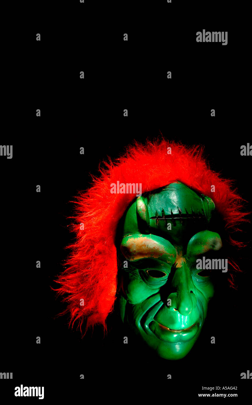 Scary green halloween mask rubber mask hi-res stock photography and ...