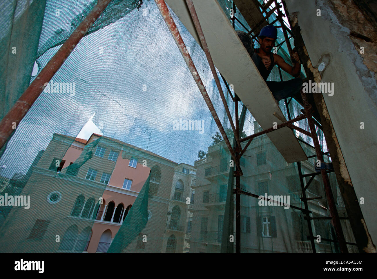 A man working at a construction site in Beirut Lebanon Stock Photo - Alamy
