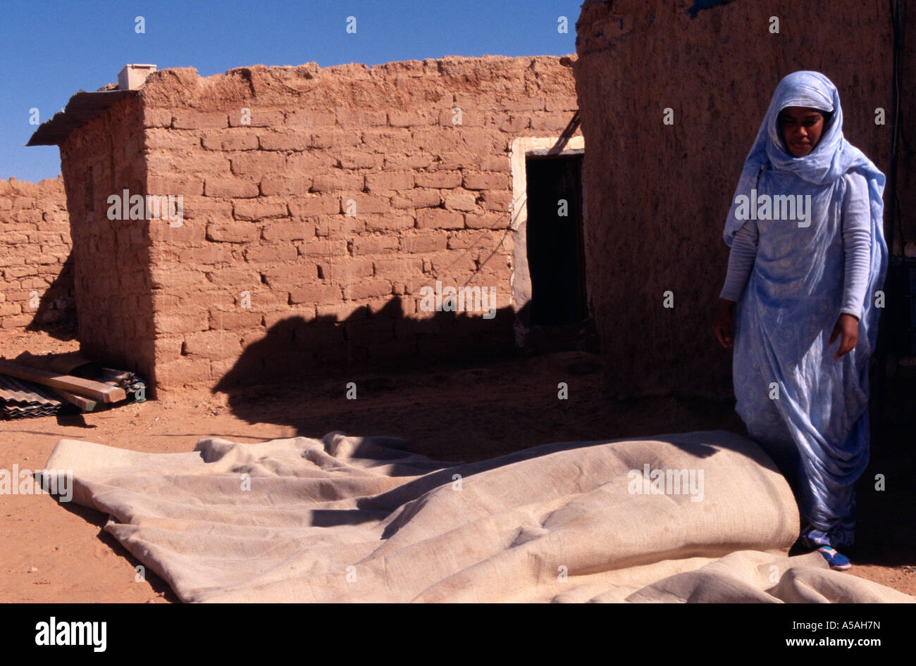 A Sahrawi woman outside her house in Tindouf Western Algeria Stock ...