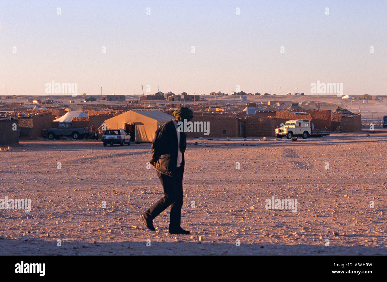A Sahrawi man walking in a refugee camp in Tindouf Western Algeria ...
