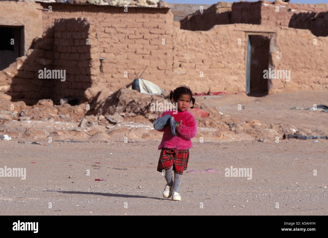A young Sahrawi girl on the streets in Western Algeria Stock Photo - Alamy