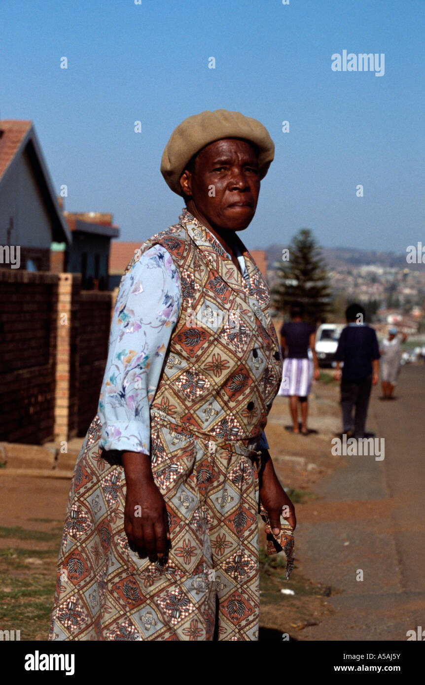 An African woman on the side of a road in Soweto South Africa Stock ...