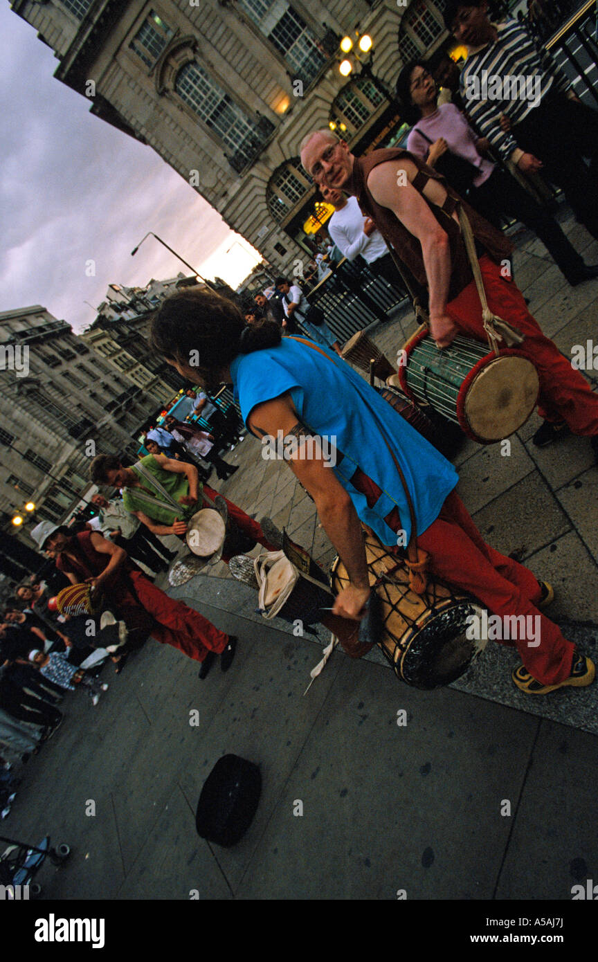 Street performers on a street in London Stock Photo - Alamy