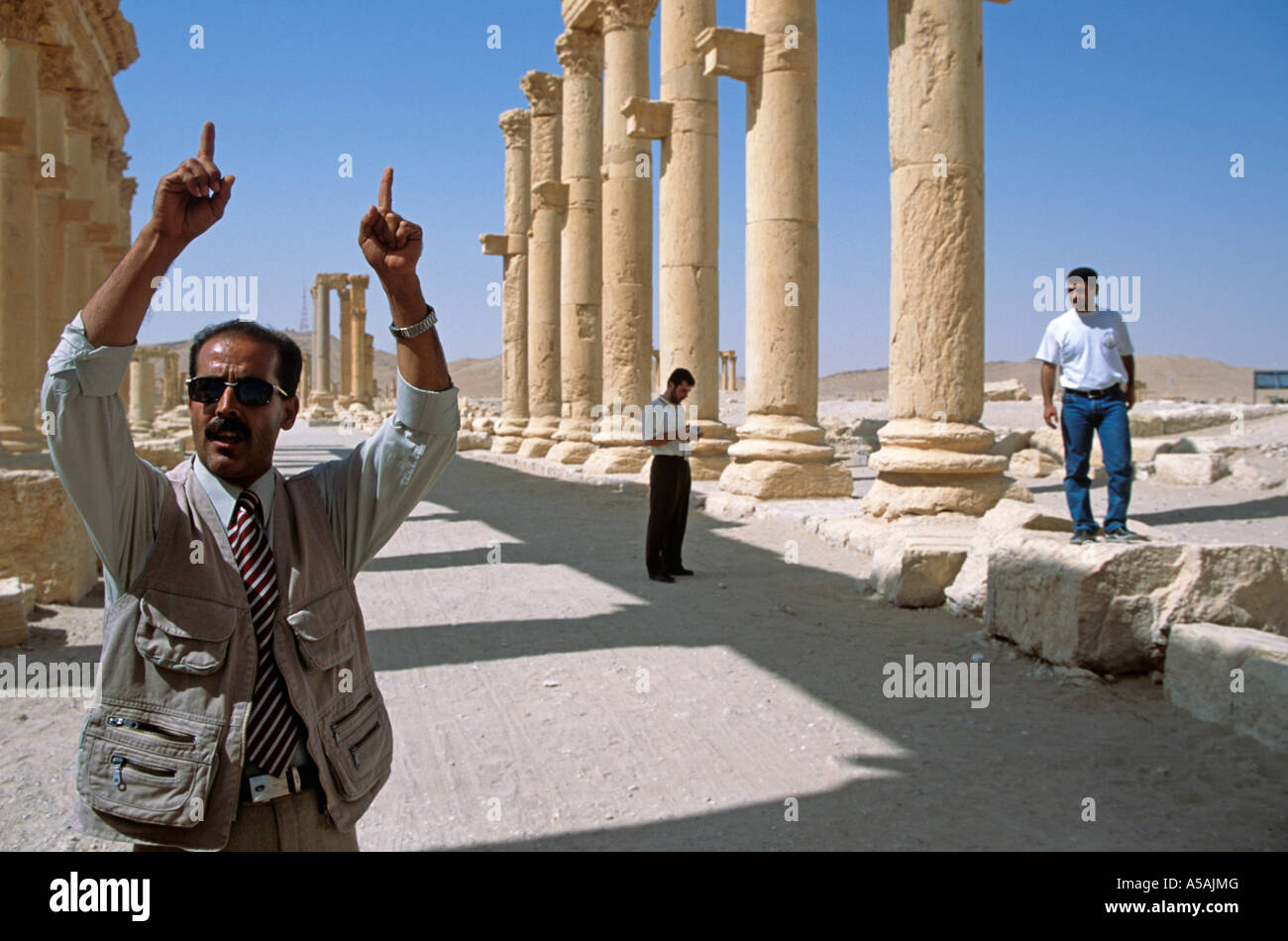 A tour guide at the Roman ruins in Palmyra Syria Stock Photo - Alamy