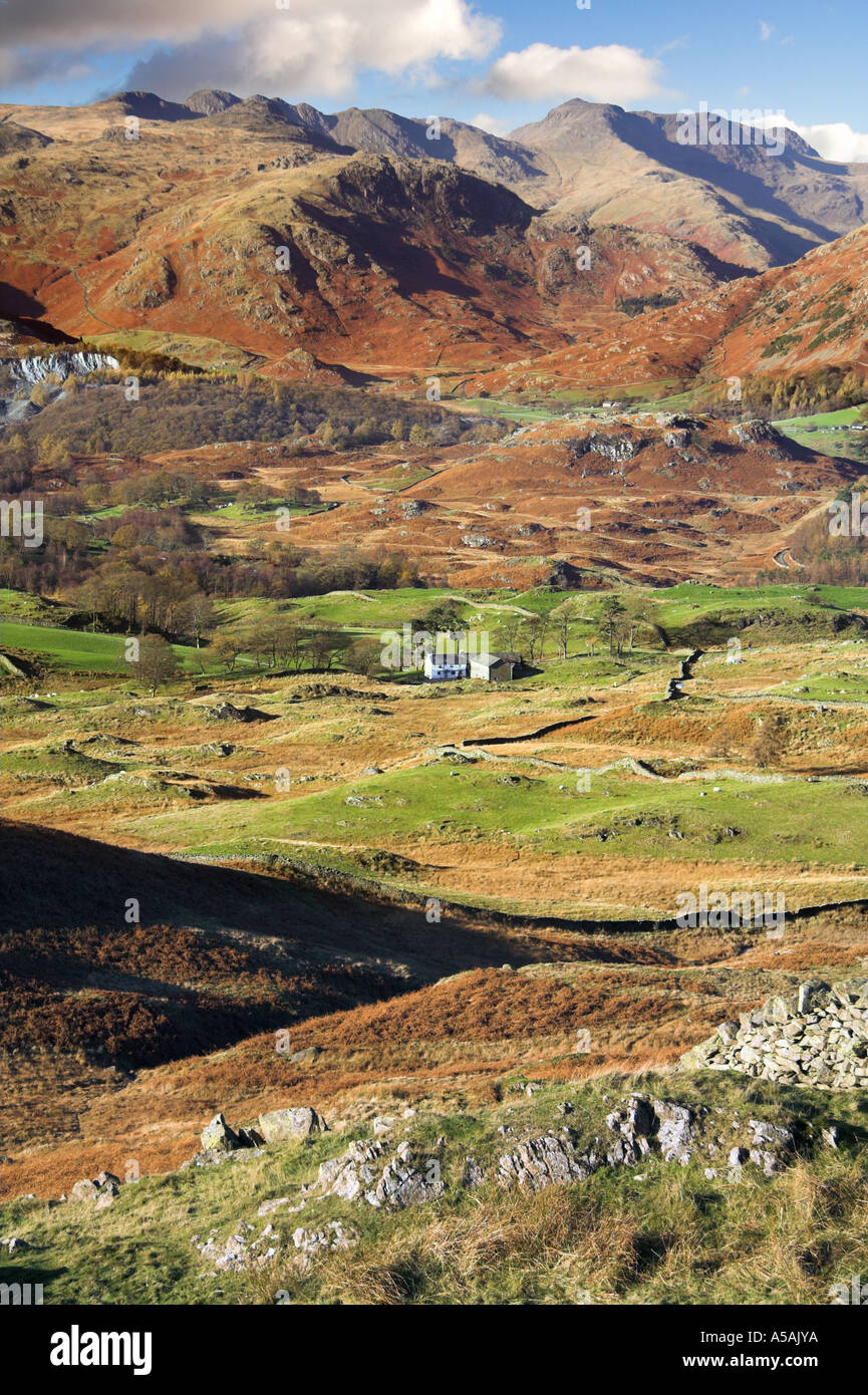 The rolling Cumbrian fells and distant rugged peaks of the Langdale ...