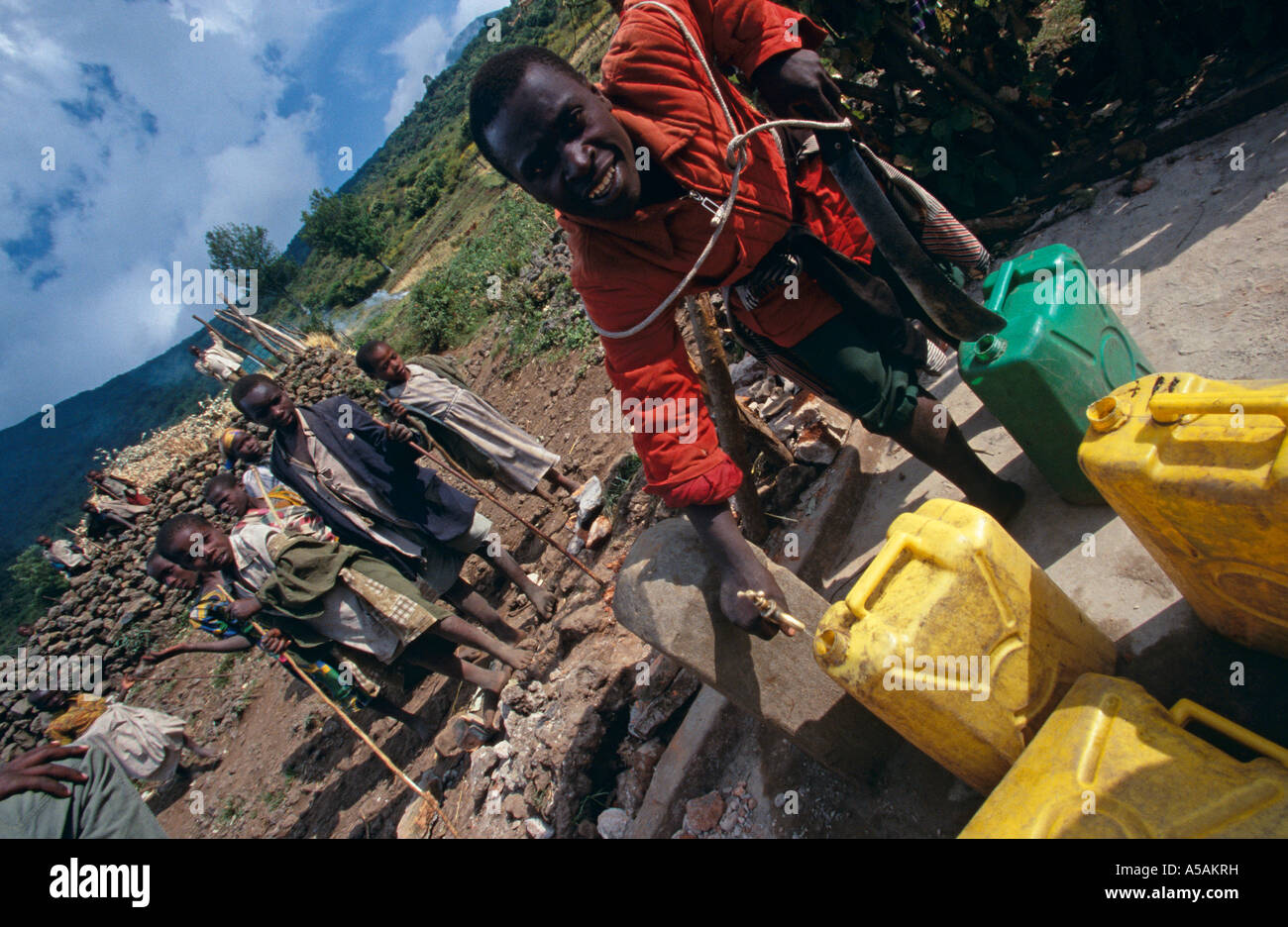 People filling water from the water project site in Western Uganda ...