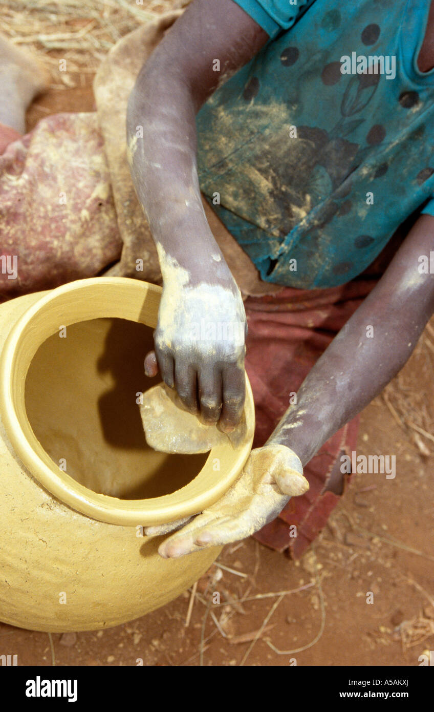 A girl doing pottery Western Uganda Africa Stock Photo - Alamy