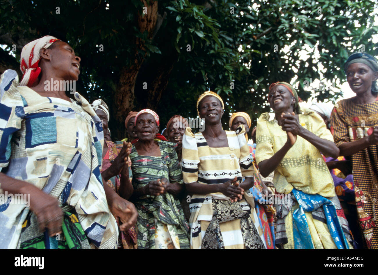 A group of African women singing and dancing in Western Uganda Africa ...