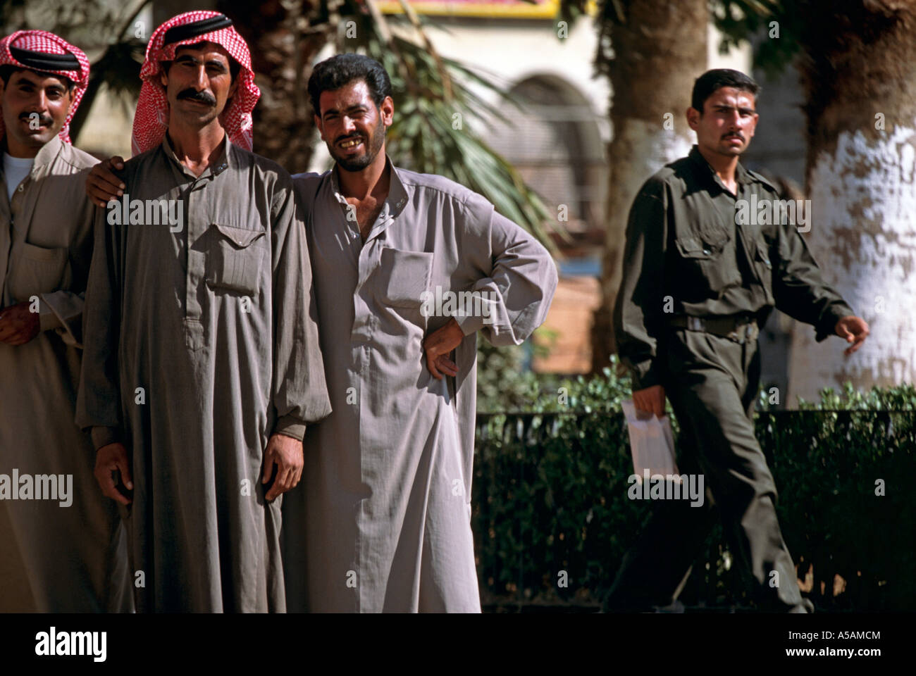 Three men posing together in Damascus Syria Stock Photo - Alamy