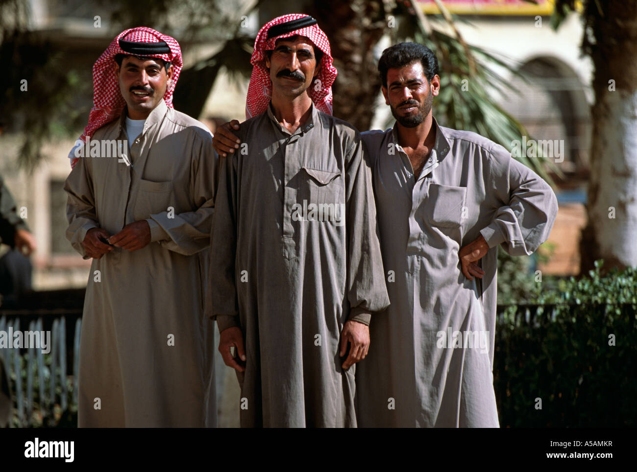 Three men posing together in Damascus Syria Stock Photo - Alamy
