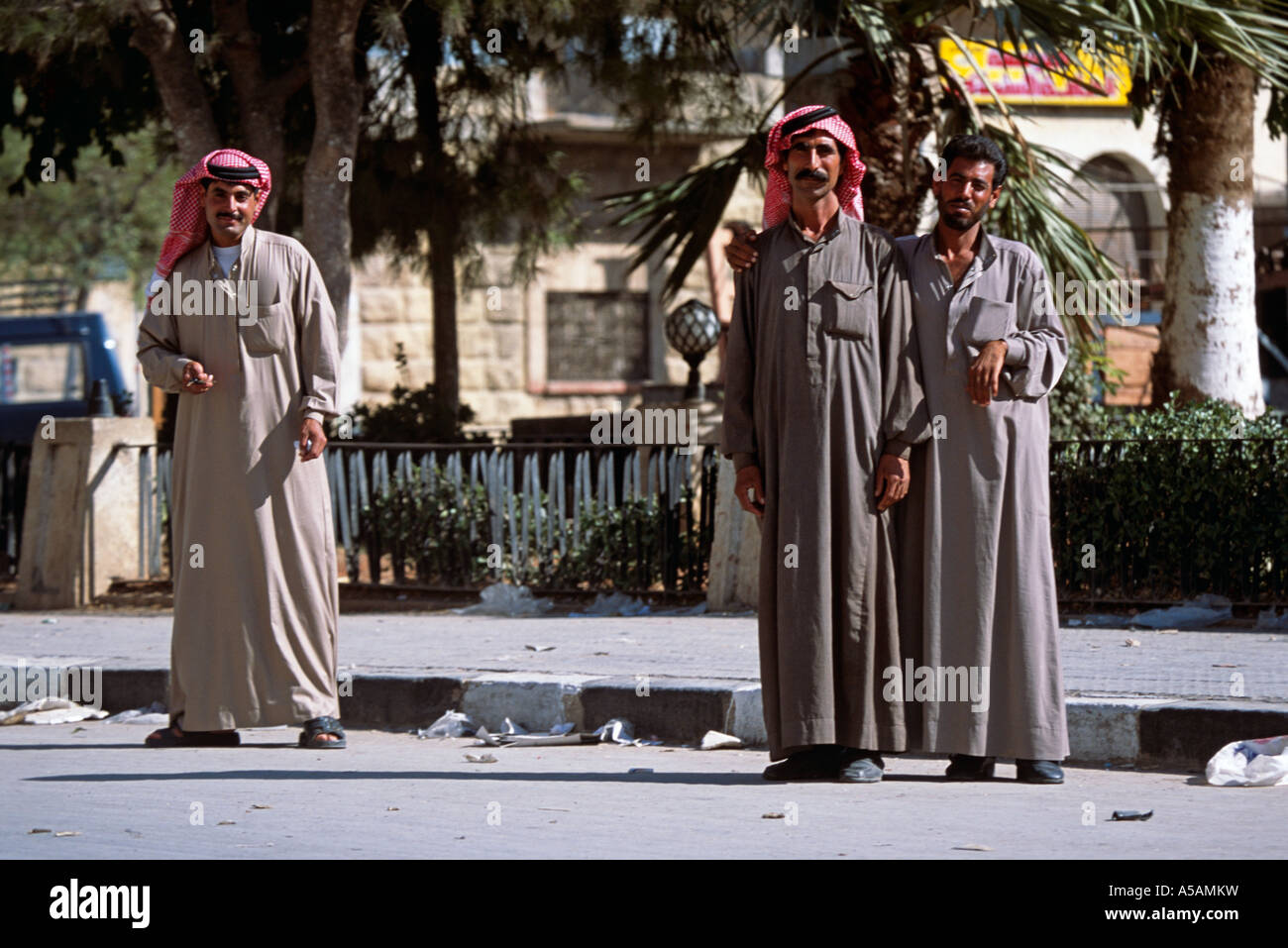 Three men posing together in Damascus Syria Stock Photo - Alamy