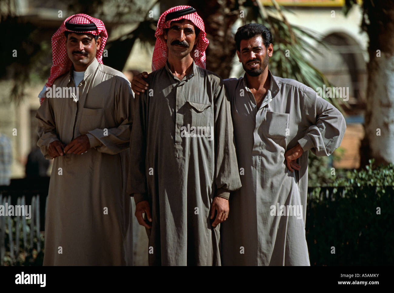 Three men posing together in Damascus Syria Stock Photo - Alamy