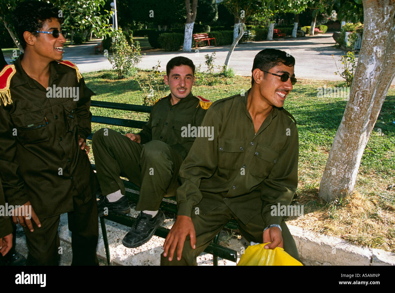 Three men sitting on a bench in Damascus Syria Stock Photo - Alamy
