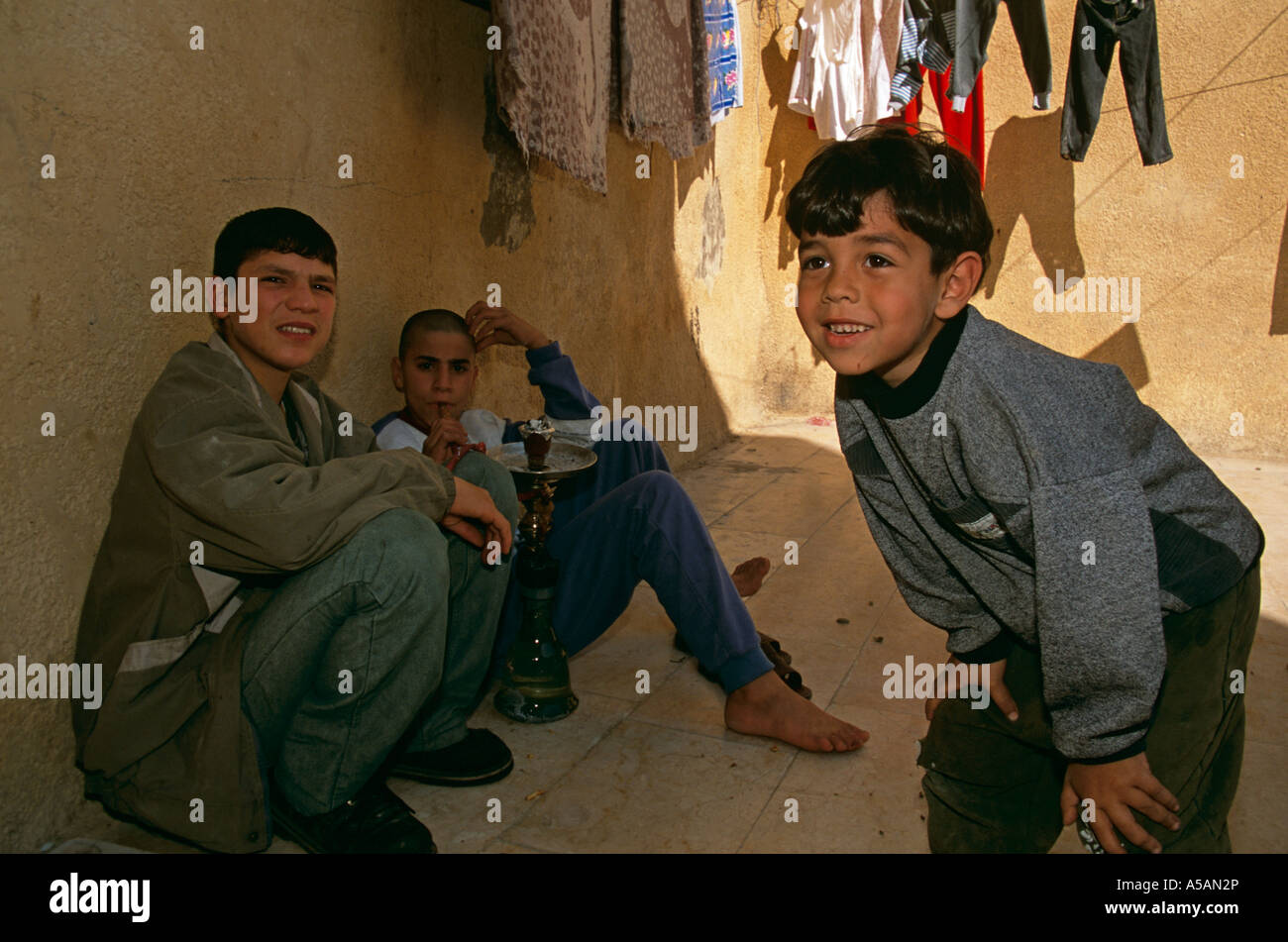 Young boys smoking hookah in Beirut Lebanon Stock Photo - Alamy