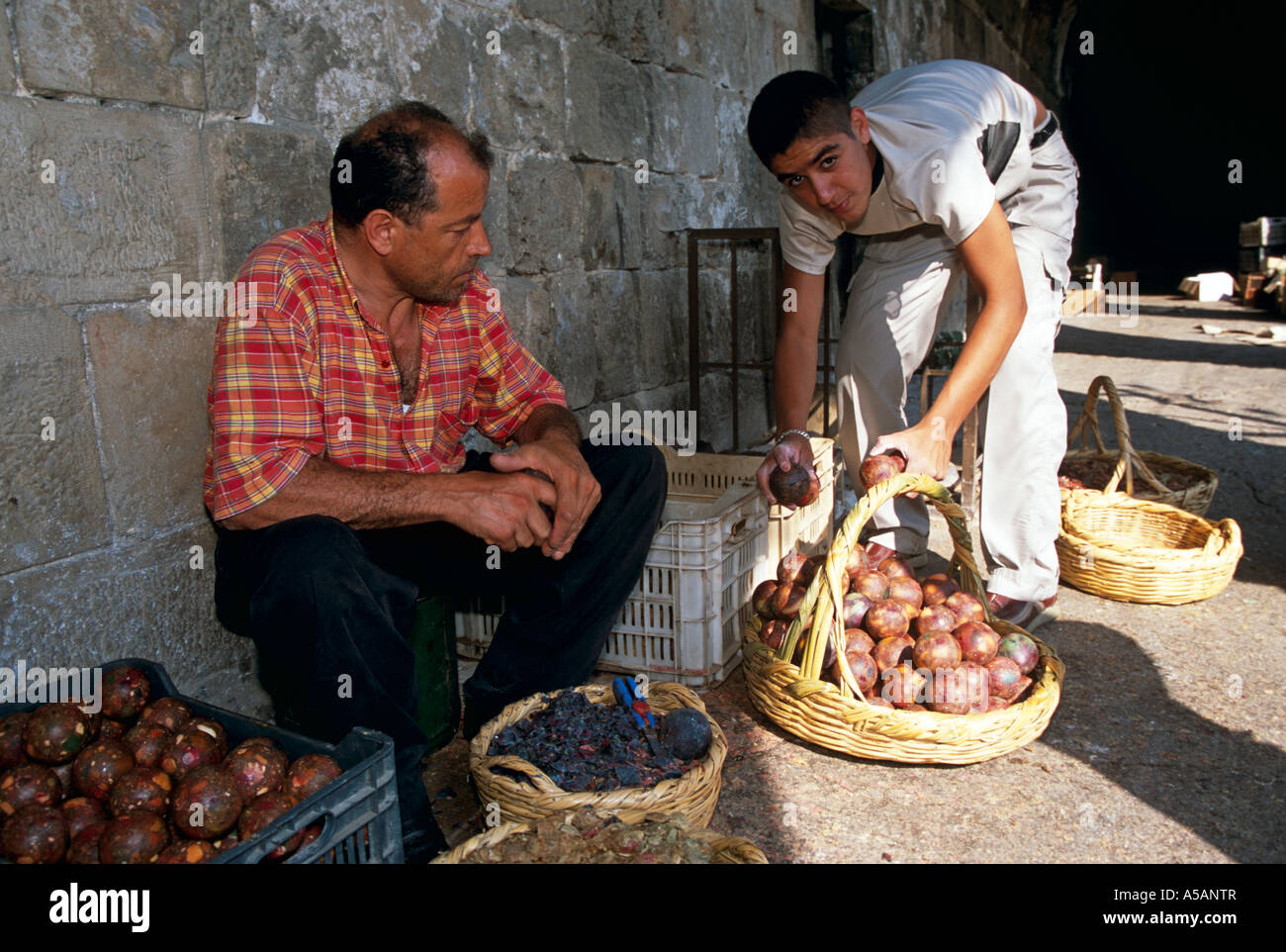 Fruits seller on pavement, Tripoli, Lebanon Stock Photo - Alamy
