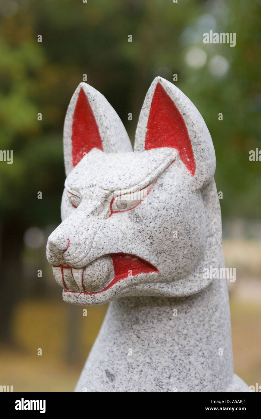 Statue of a guardian fox kitsune at Nara Park, Kansai Region, Japan ...