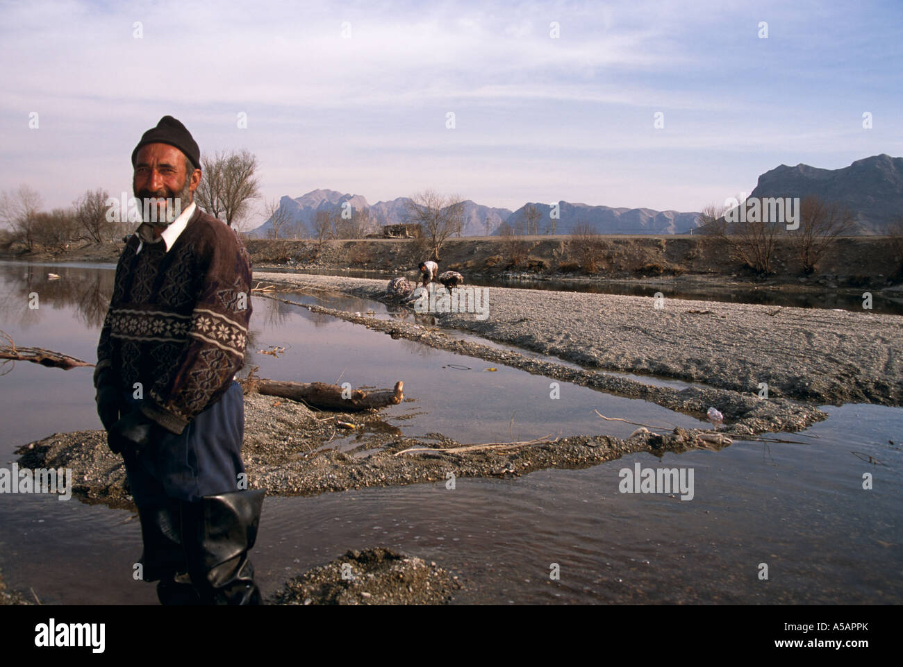 Person standing river in hi-res stock photography and images - Alamy