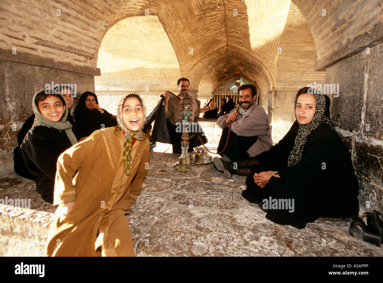 People sitting and smoking hookah in Esfahan Iran Stock Photo - Alamy