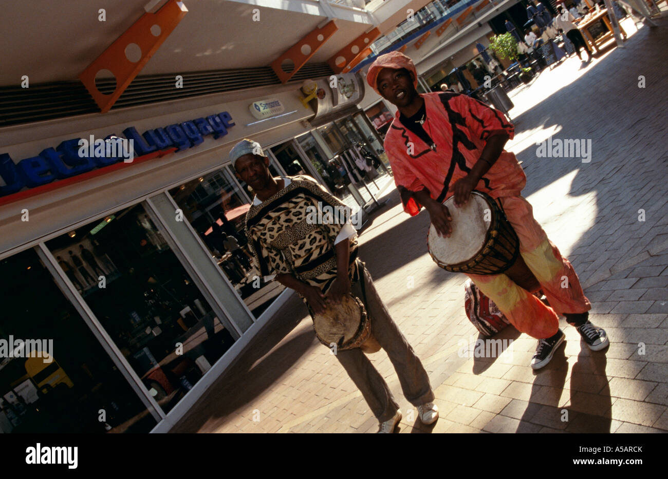 Men playing musical instruments on the streets of Rosebank Johannesburg ...