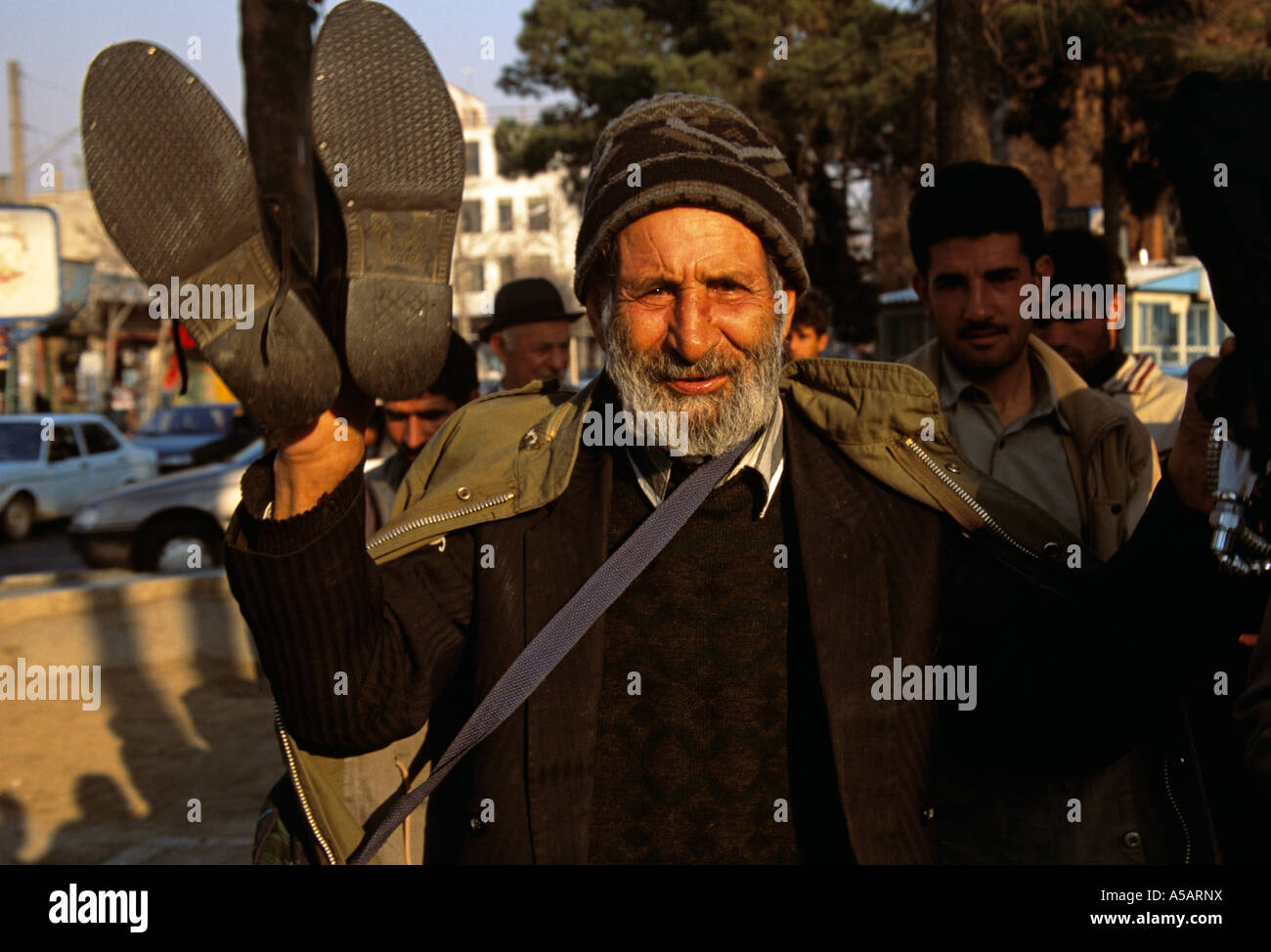 A street vendor selling shoes in Teheran Iran Stock Photo - Alamy