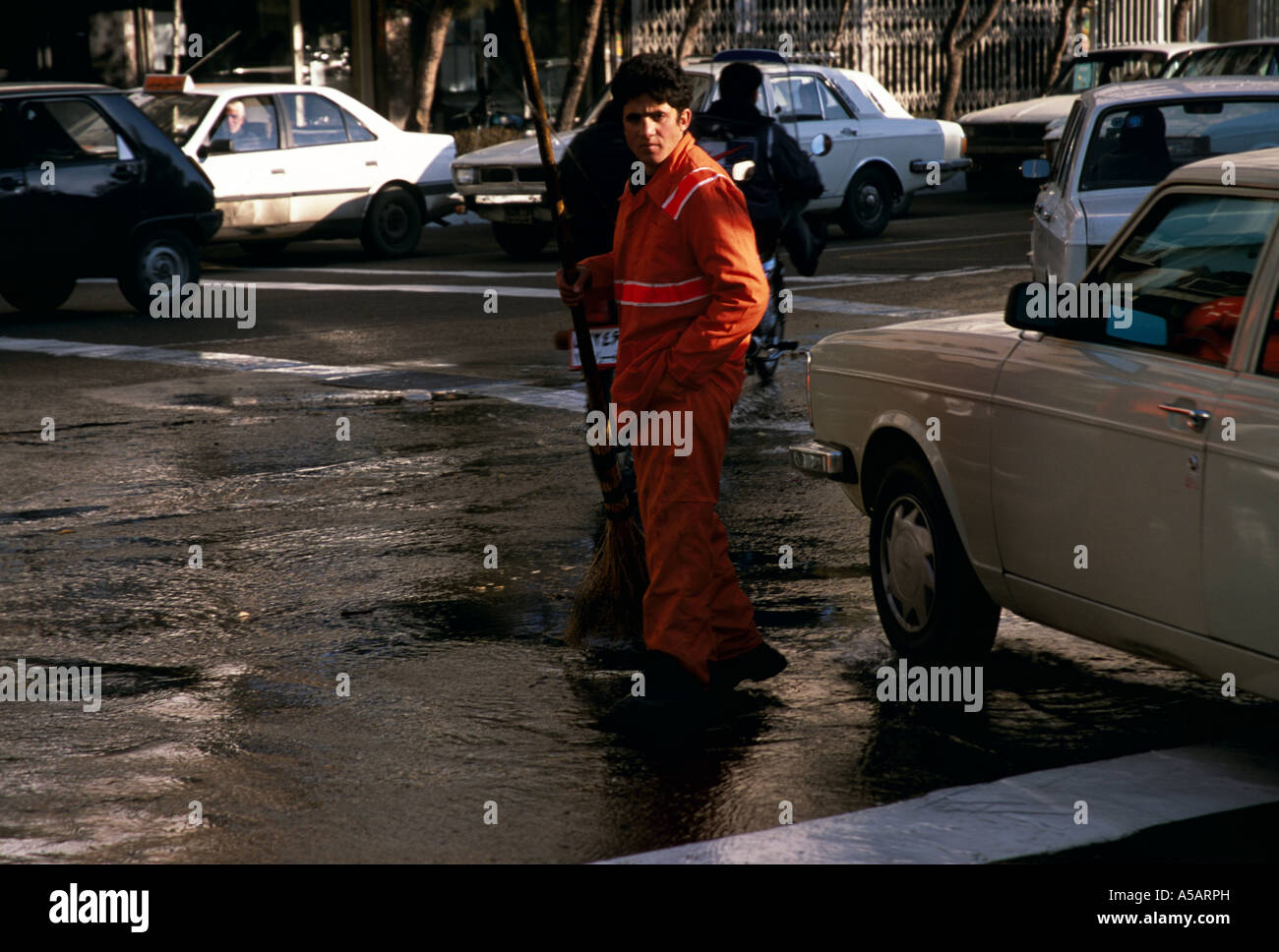 A street cleaner in Teheran Iran Stock Photo - Alamy