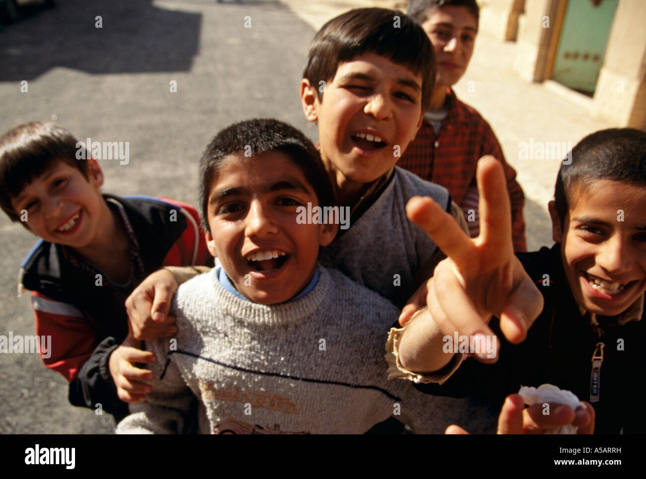 Children playing together in Tehran Iran Stock Photo - Alamy