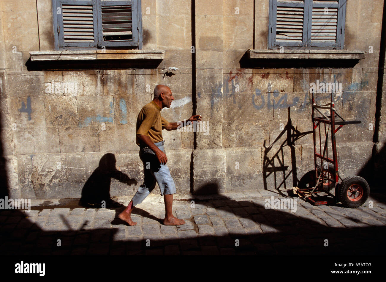 Homeless man walking on streets, Beirut, Lebanon Stock Photo - Alamy