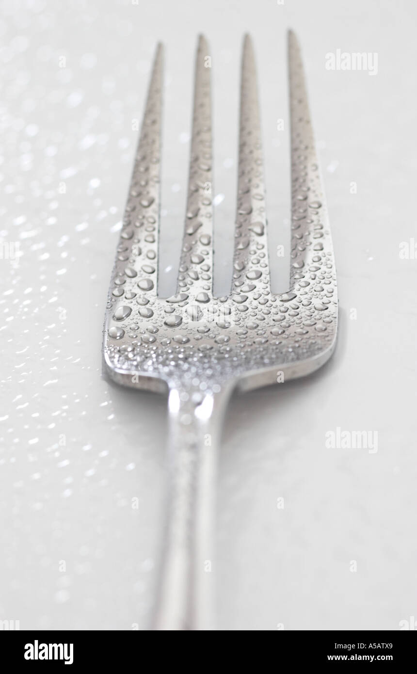 Fork close up view with water droplets Stock Photo - Alamy