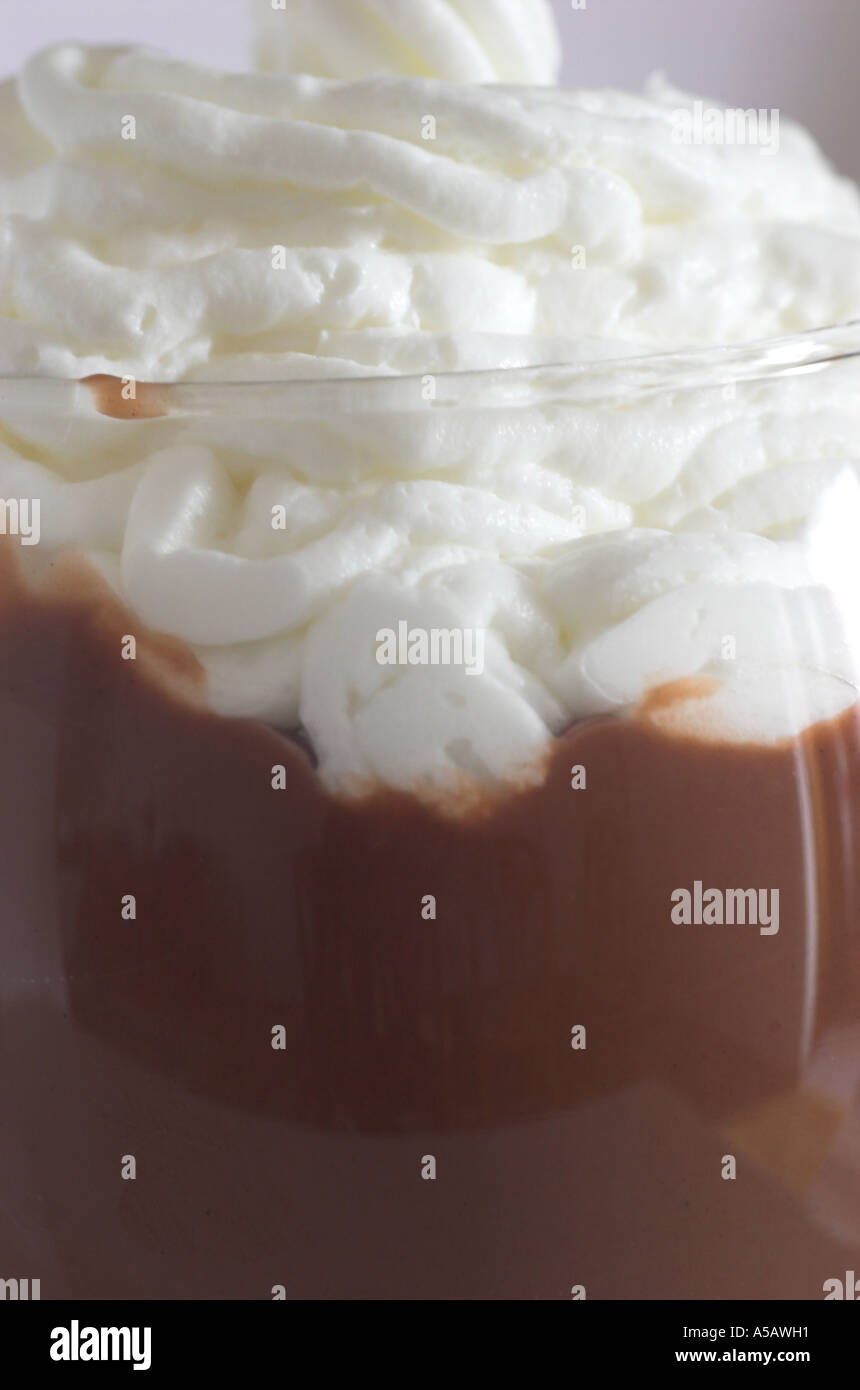Chocolate pudding with whipped cream on top close up Stock Photo - Alamy