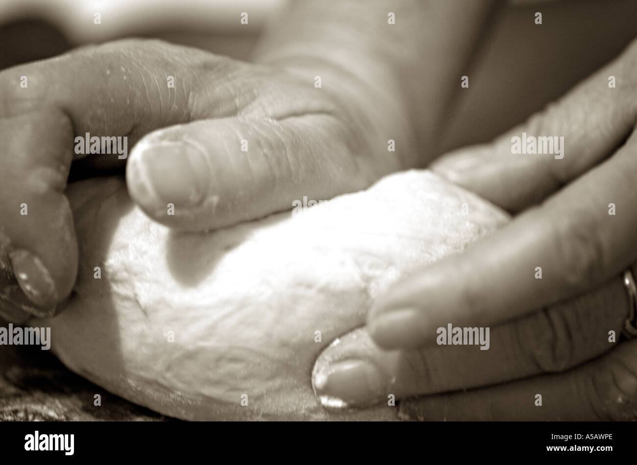 Hands mature female kneading hi-res stock photography and images - Alamy