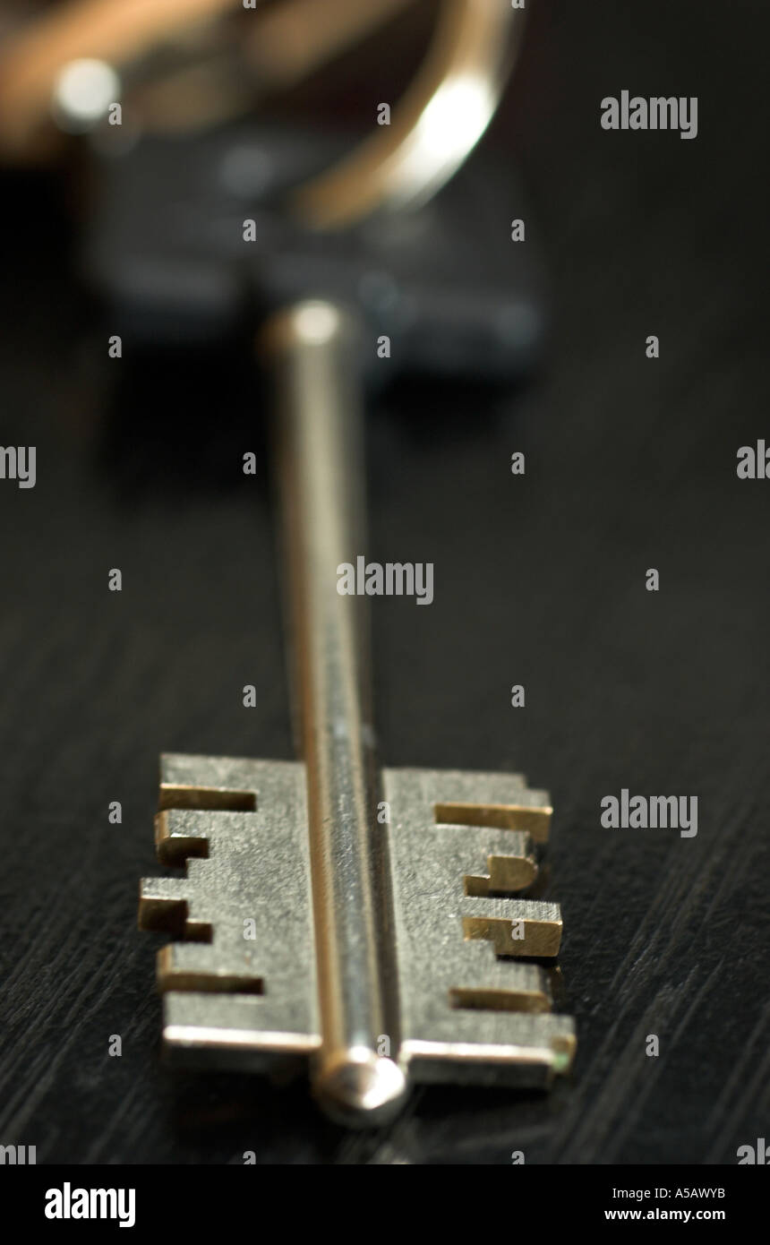 Key on black background Stock Photo - Alamy