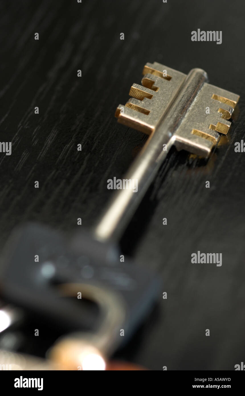 Key on black background Stock Photo - Alamy