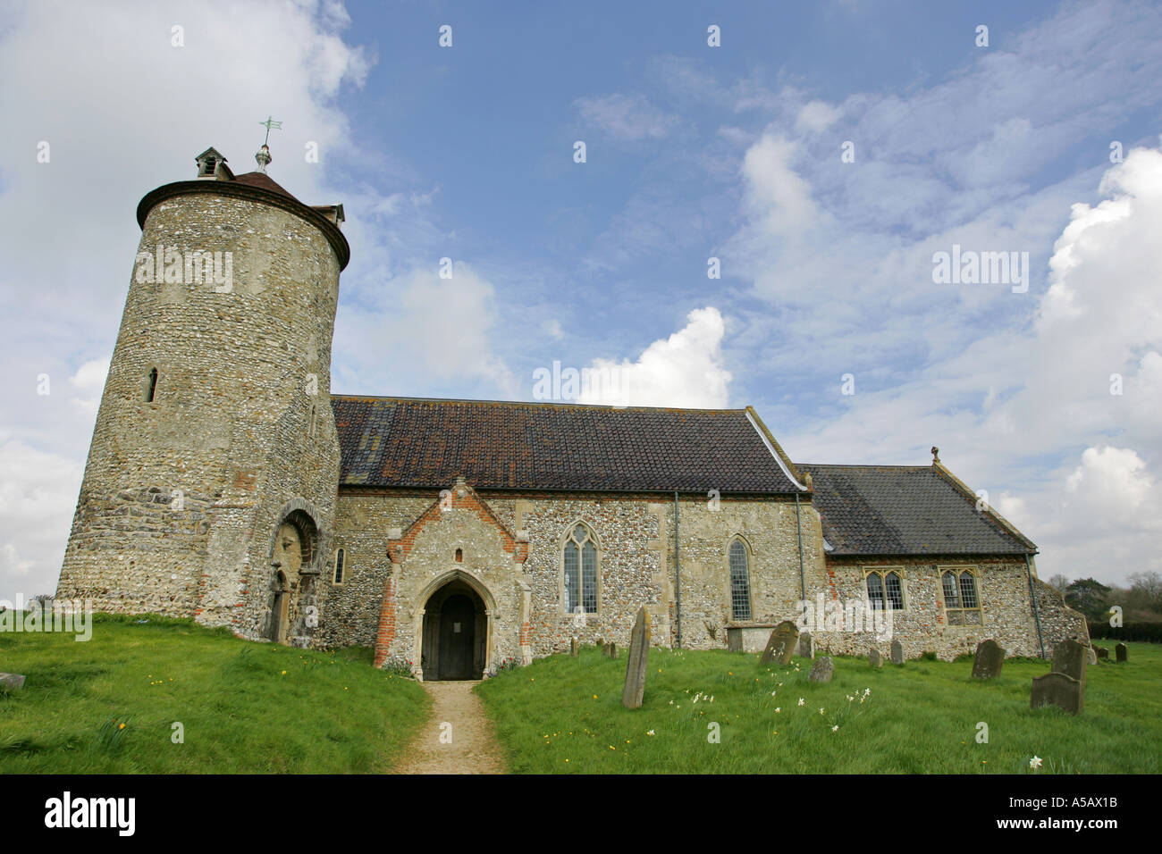 Typical ancient Norman architecture St Andrews church in Norfolk East ...