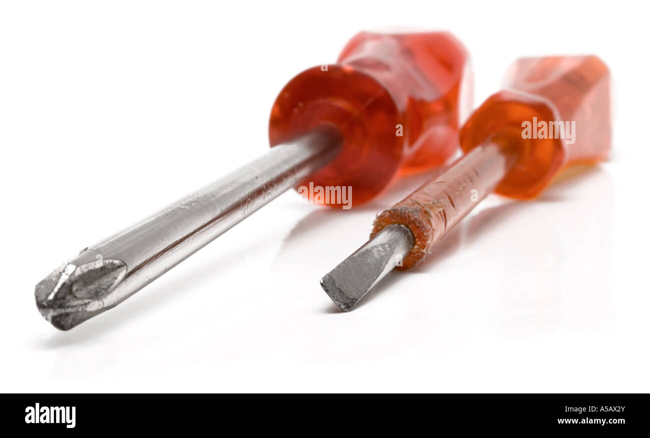 Two red screwdrivers isolated on a white background. Shallow depth of ...