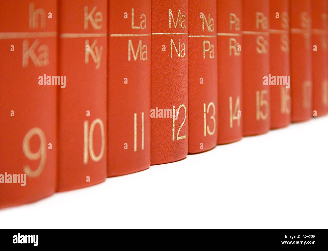 Red books isolated on white background. Shallow depth of field. Focus ...