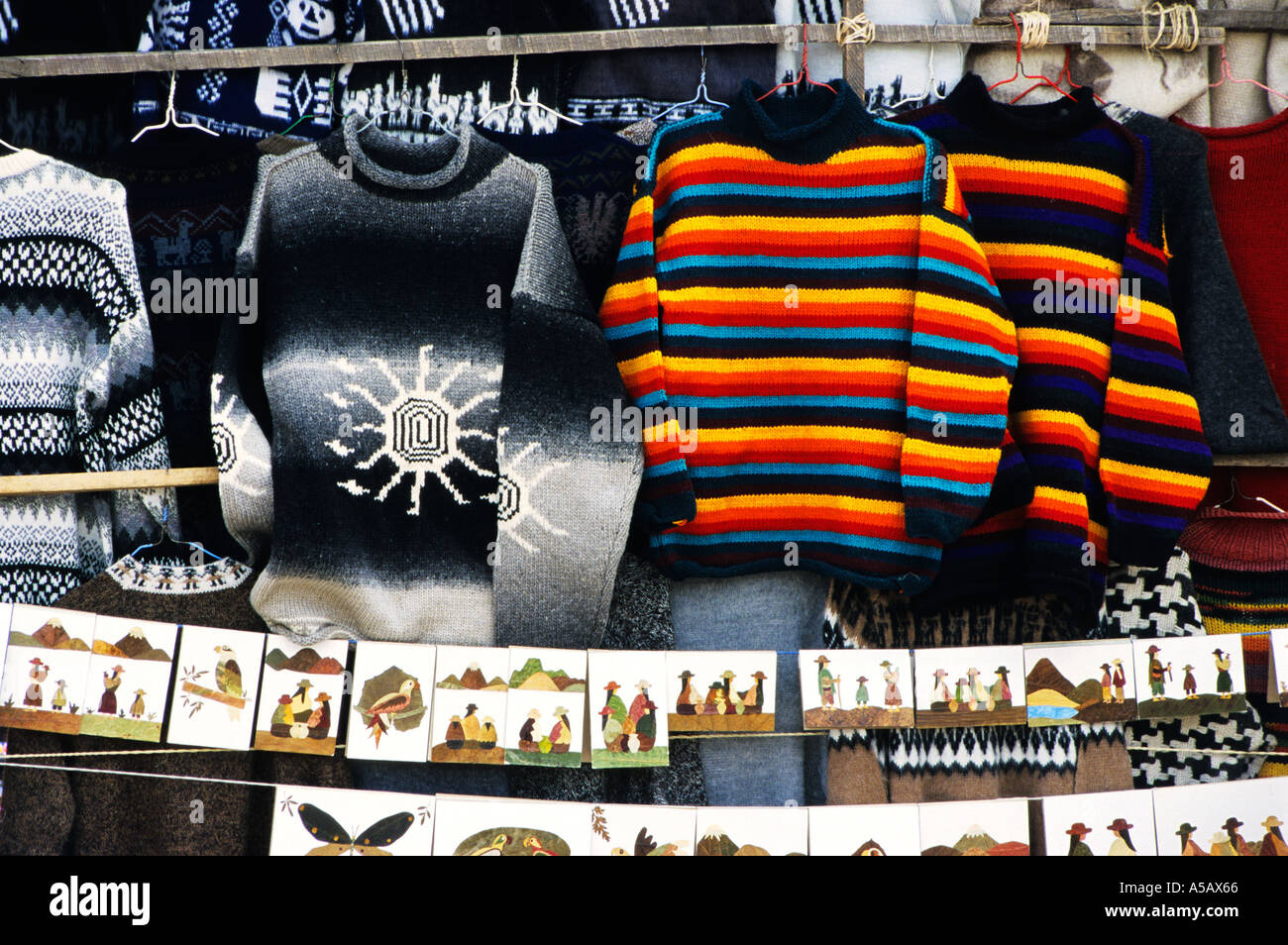 Sweaters and pictures for sale at Saquisili Market Ecuador Stock Photo ...