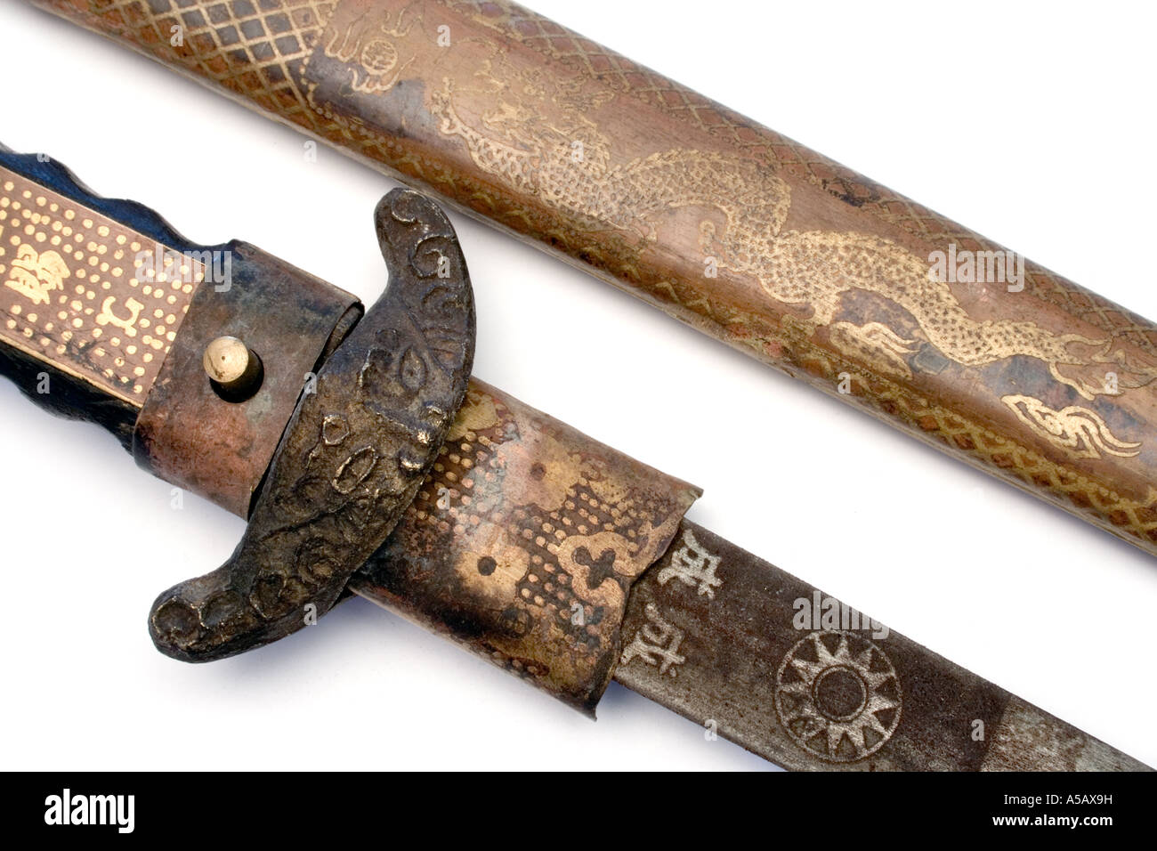 Detail shot of an ancient samurai sword. Isolated on a white background ...