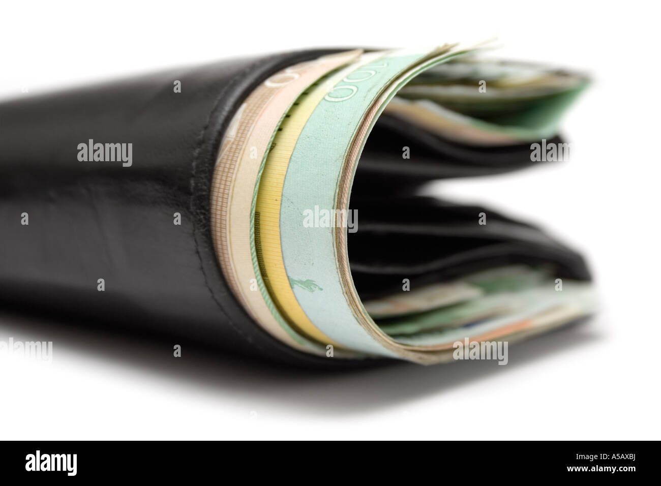 Overflowing purse hi-res stock photography and images - Alamy